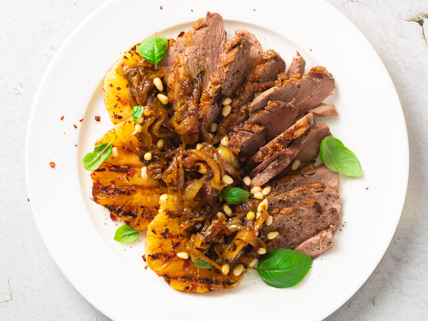GOOSE BREAST WITH PINEAPPLE AND CARAMELIZED ONION